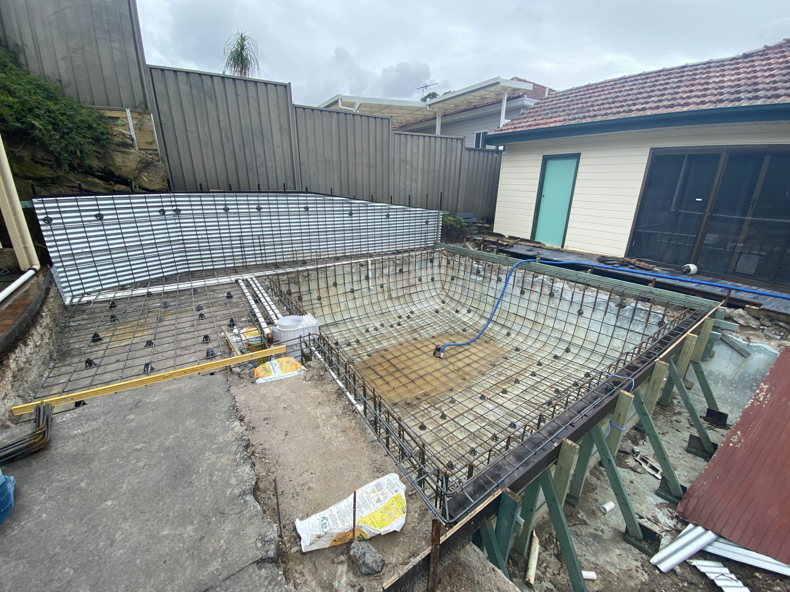 Pool Renovation - New Pool inside of existing pool in Loftus ...