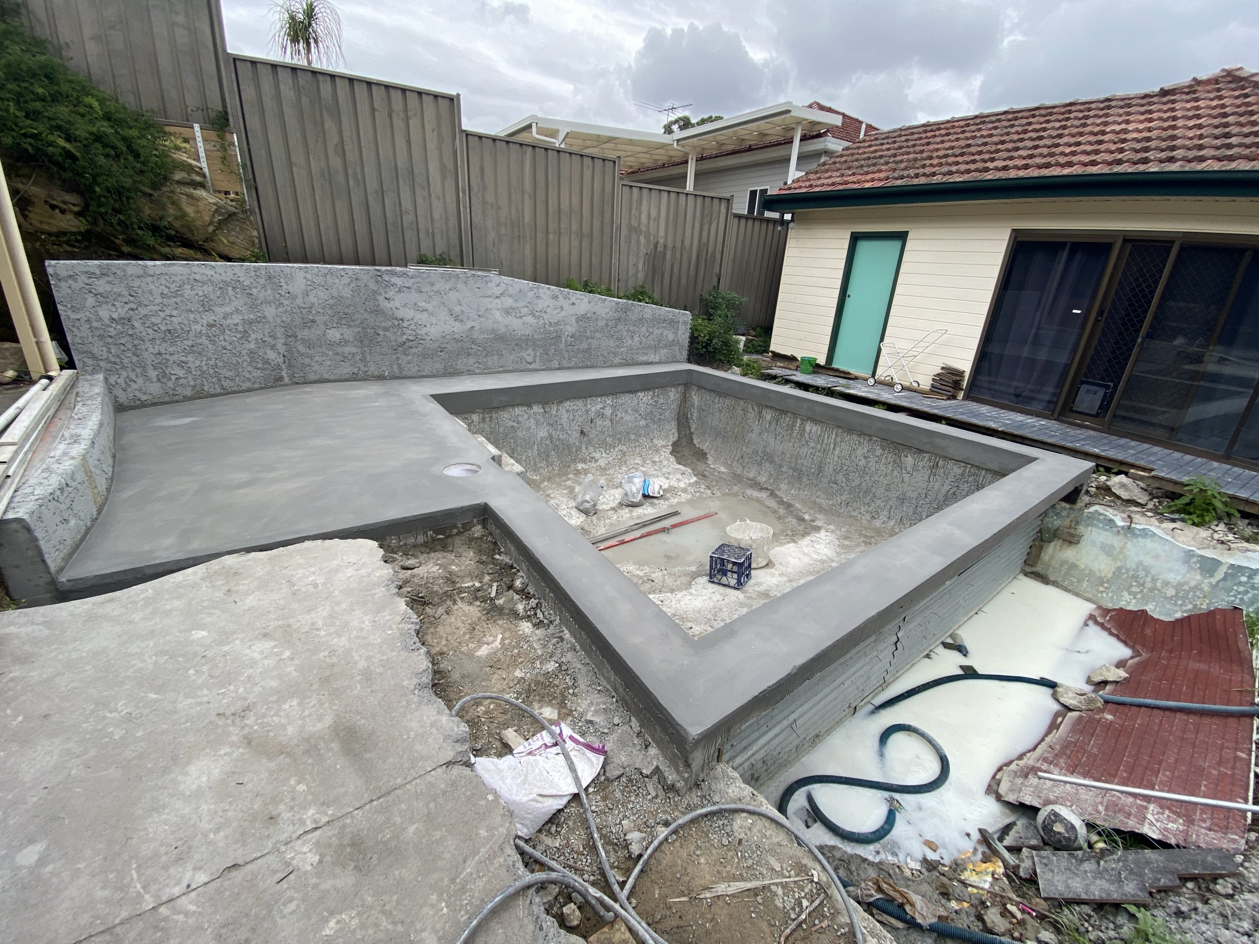 Pool Renovation - New Pool inside of existing pool in Loftus ...