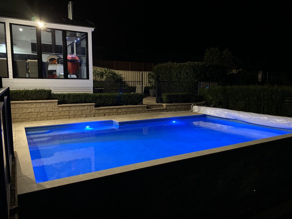 New pool lights in a pool renovation. | Improvement Pools